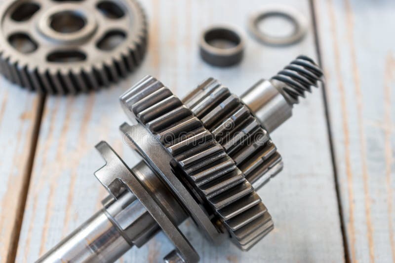 Gear Wheels on a Wooden Table Stock Image - Image of metal, brown ...