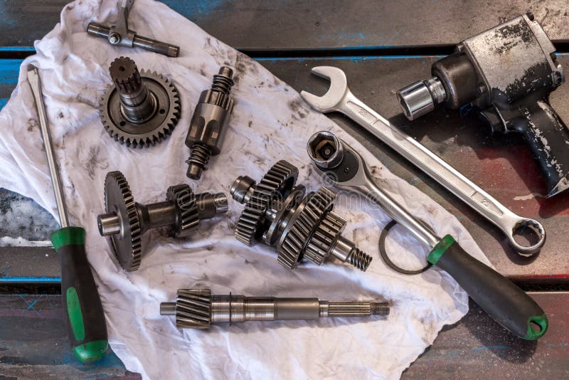 Gearbox Parts on a Wooden Table with Tools Stock Photo - Image of ...