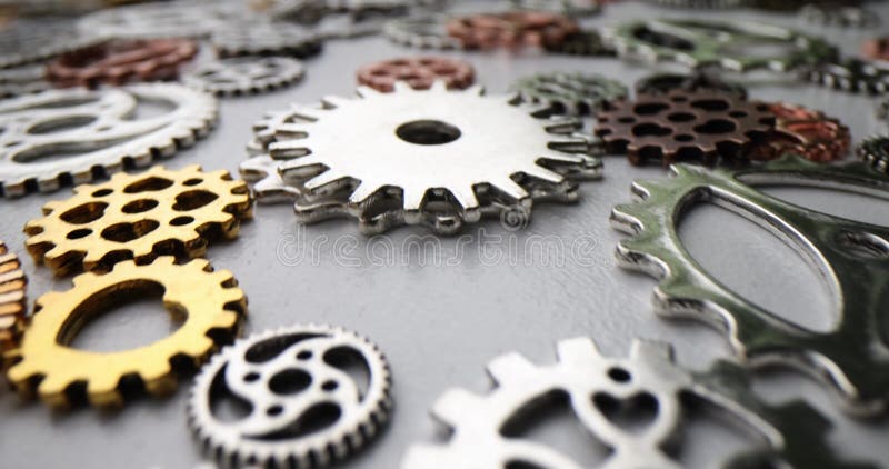 Gears and Cog Symbols of Various Sizes on Grey Surface Stock Footage ...