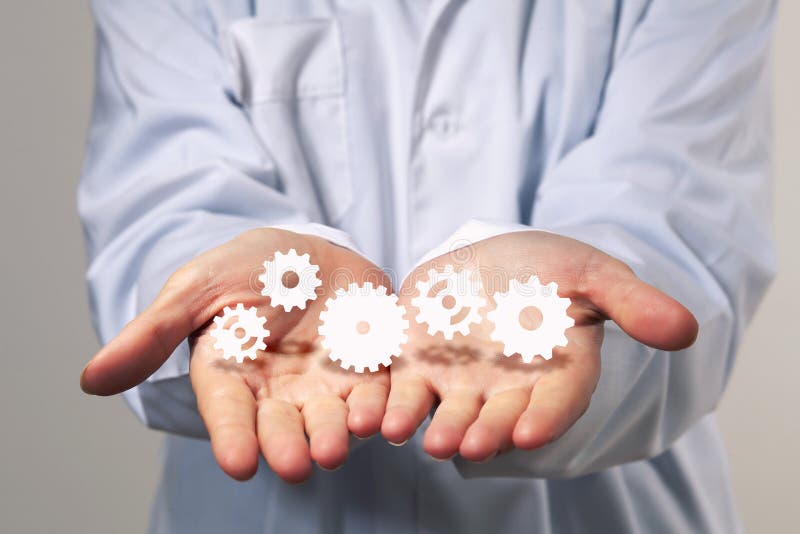 Gears in hands stock photo. Image of caucasian, connection - 56765730