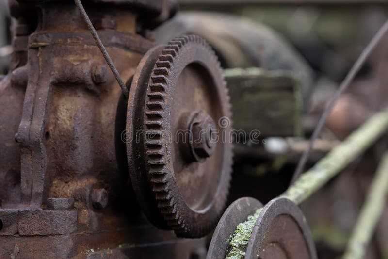 Gears Rollers of an Old Rusty Motor on the Farmyard Stock Photo - Image ...