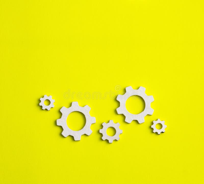 Gears on Yellow Background - Business Productivity Concept Stock Photo ...