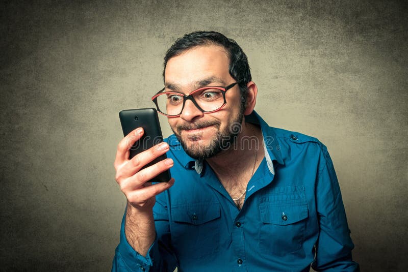 Geek with beard and phone stock image. Image of adult - 71186607