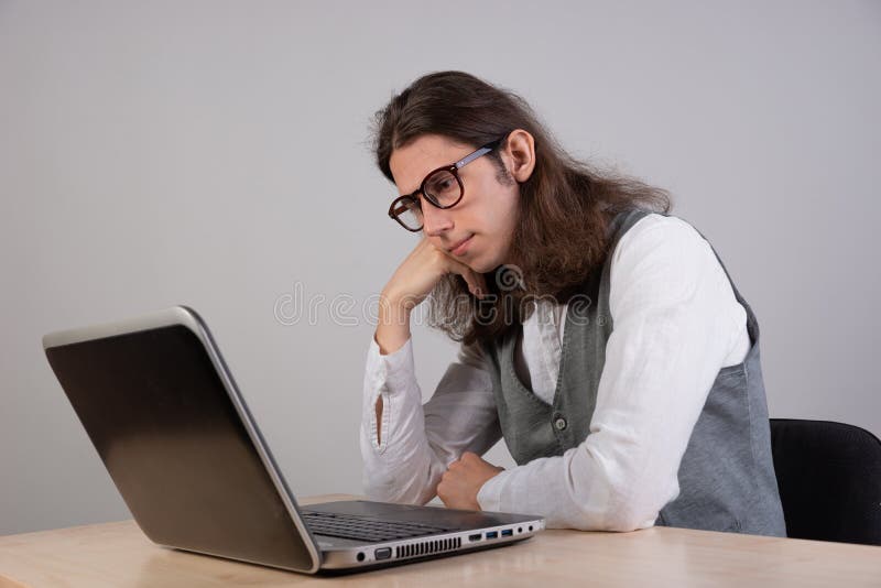 Geek Guy Is Trying To Write Code Or Learn A New Programming Language