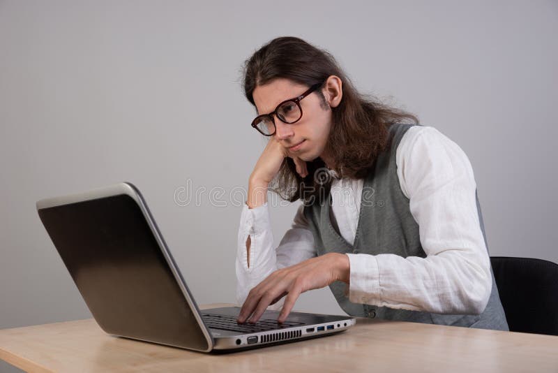 Geek Guy Is Trying To Write Code Or Learn A New Programming Language