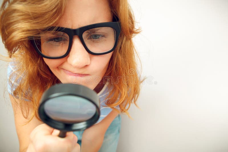 Geek Looking through Magnifying Glass. Stock Image - Image of funny ...