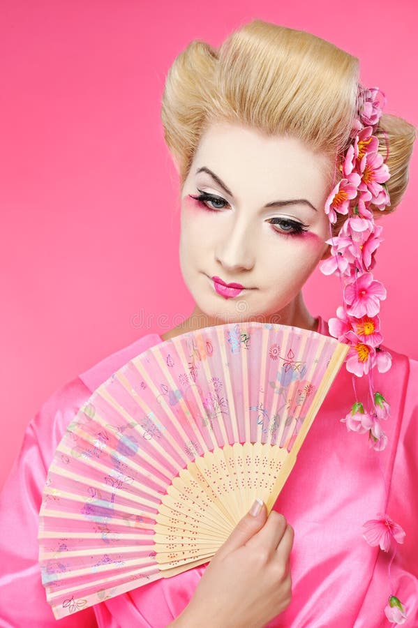 Geisha with a fan stock photo. Image of holding, clothing - 13729632