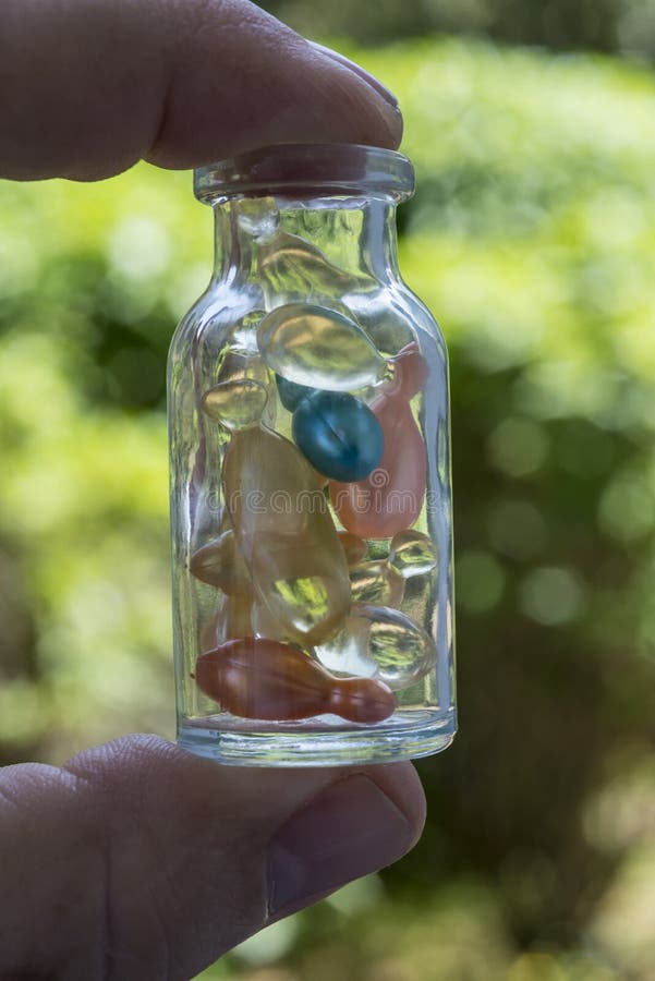 Gel Capsules in a Glass Bottle Stock Image - Image of capsule, medical ...