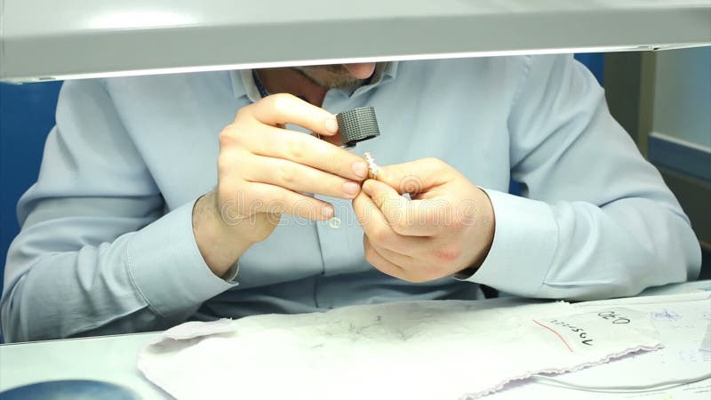 The Gemologist Checking the Diamonds Look at Loop Diamond. Carat in ...