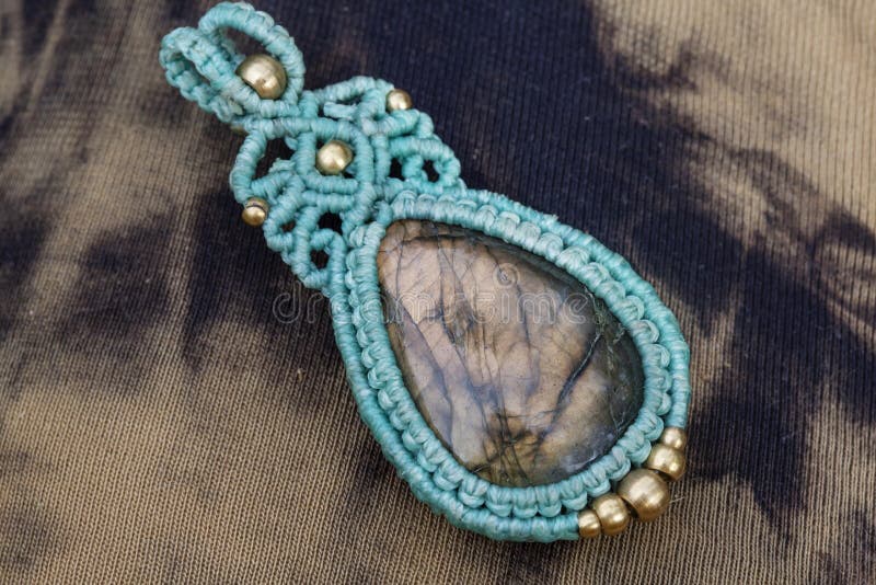 Gemstone Macrame Pendant on Natural Background Stock Photo - Image of ...