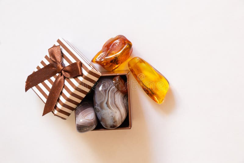 Gemstones Amber Agate in a Gift Box on a White Background Stock Photo ...