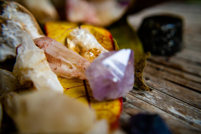 Gemstones and Crystals Displayed on a Plate Atop a Table Stock Photo ...