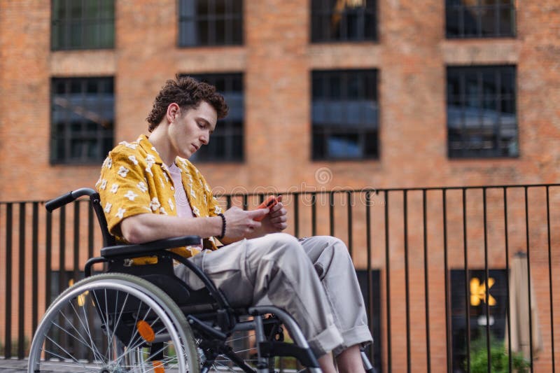 Hansome Gen Z Boy in a Wheelchair with His Girlfriends. Love with ...