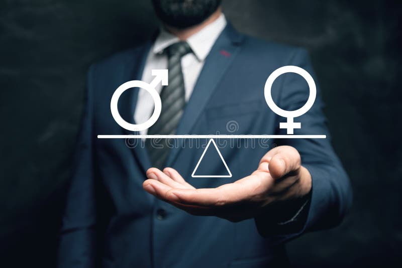 Gender Equality on the Scales. Man Holding in His Hand Stock Photo ...