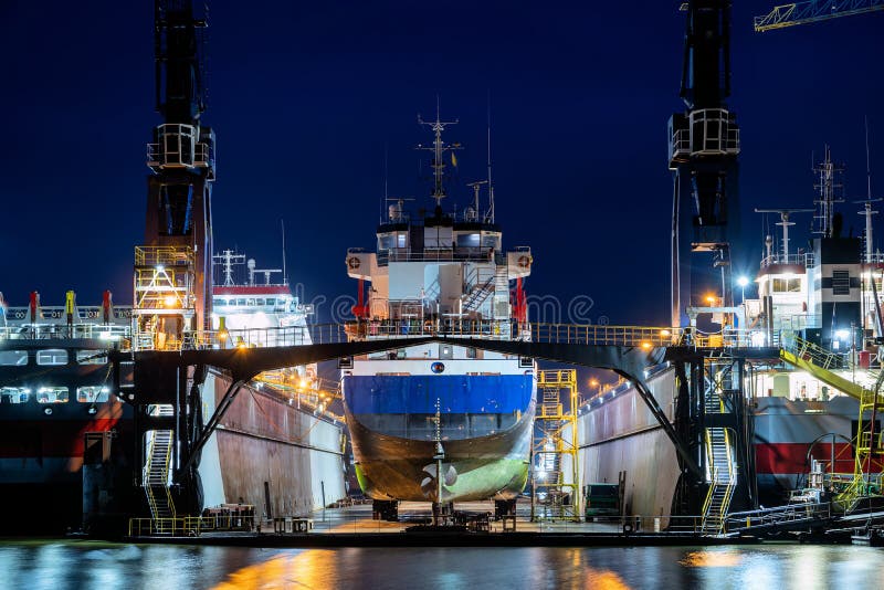 Ship in floating dock editorial image. Image of night - 260472020