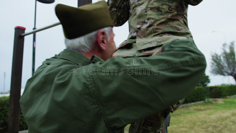 General Checks the Physical Test of the Military Cadet with Pull-ups ...