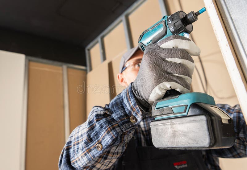 General Contractor Installing Drywall Panel Stock Image - Image of ...