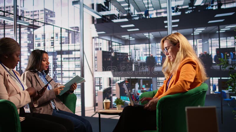 General Director Reviewing Data Analytics with Her Team for Successful ...