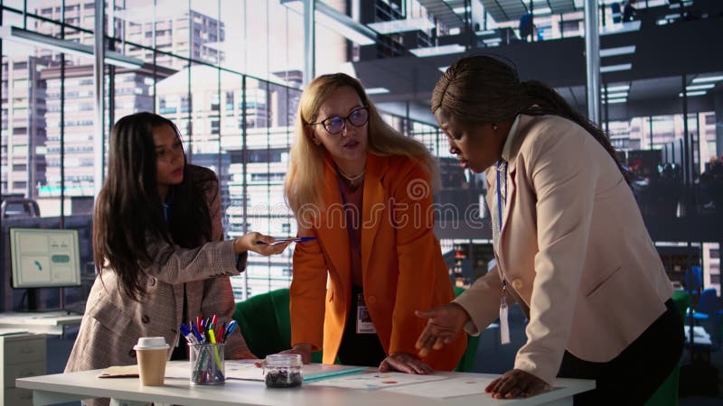 General Director Reviewing Data Analytics with Team for Successful ...