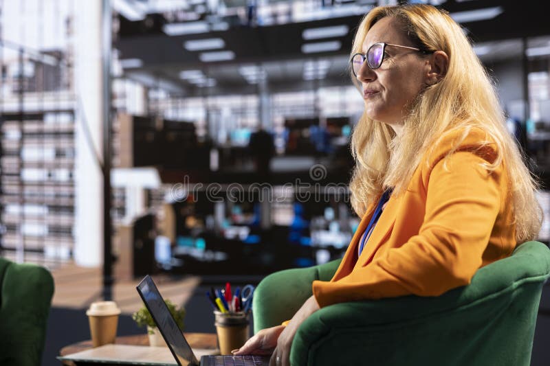 General Director Reviewing Data Analytics with Team for Successful ...