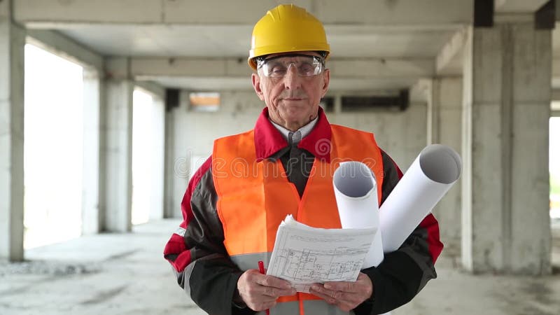 General Foreman with Building Drawings at Project Site Stock Footage ...