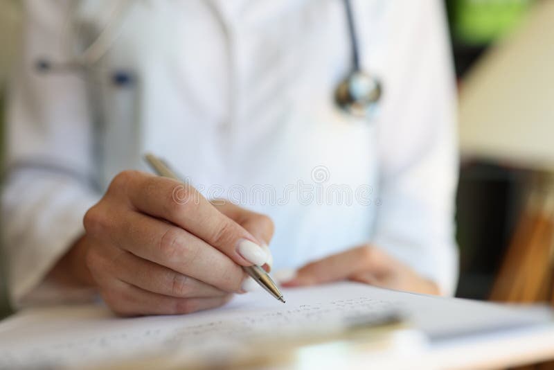 General Practitioner at Desk Fills in Medical Documents Stock Image ...