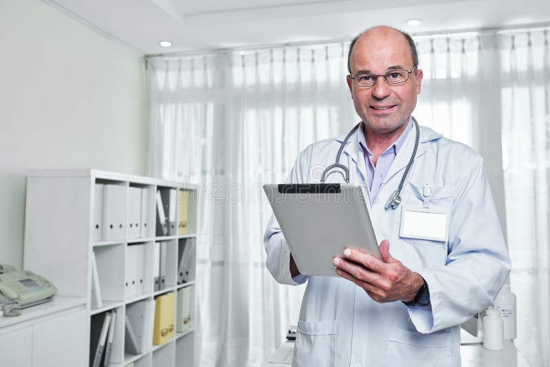 General Practitioner with Tablet Computer Stock Image - Image of adult ...