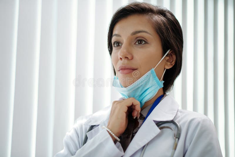 Doctor Taking Off Medical Mask Stock Image - Image of ambition ...