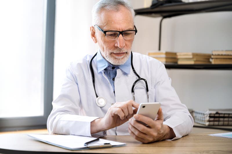 General Practitioner Using Smartphone for Making Appointment and ...