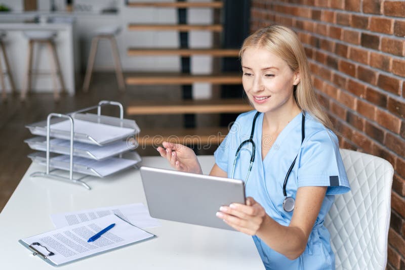 General Practitioner Using Tablet, Make Video Call Stock Image - Image ...