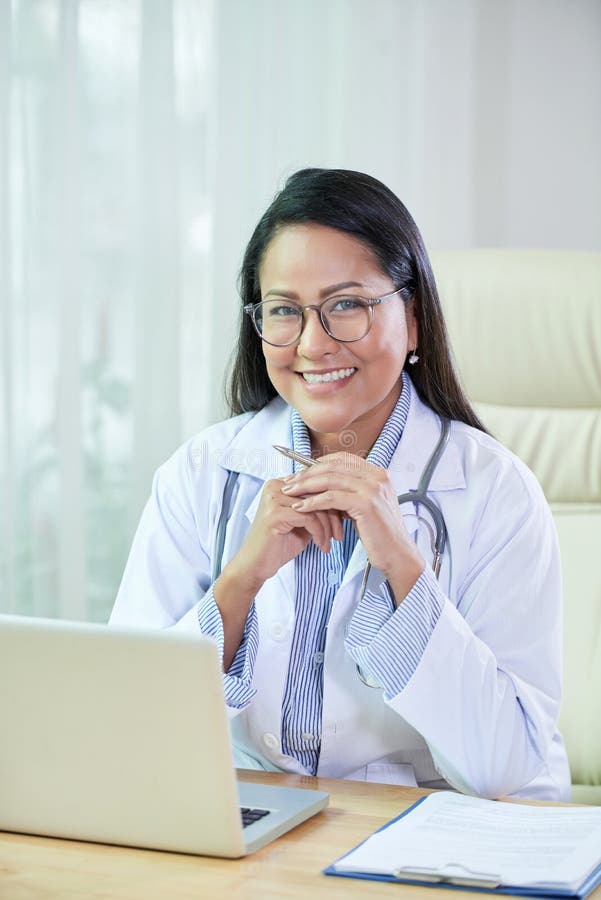 General Practitioner Working on Tablet Stock Photo - Image of clinic ...
