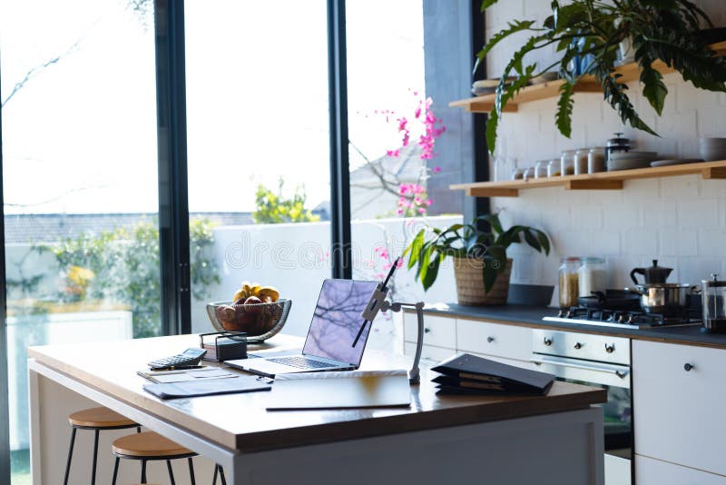 General View of Modern Kitchen with Laptop and Tablet on Countertop ...