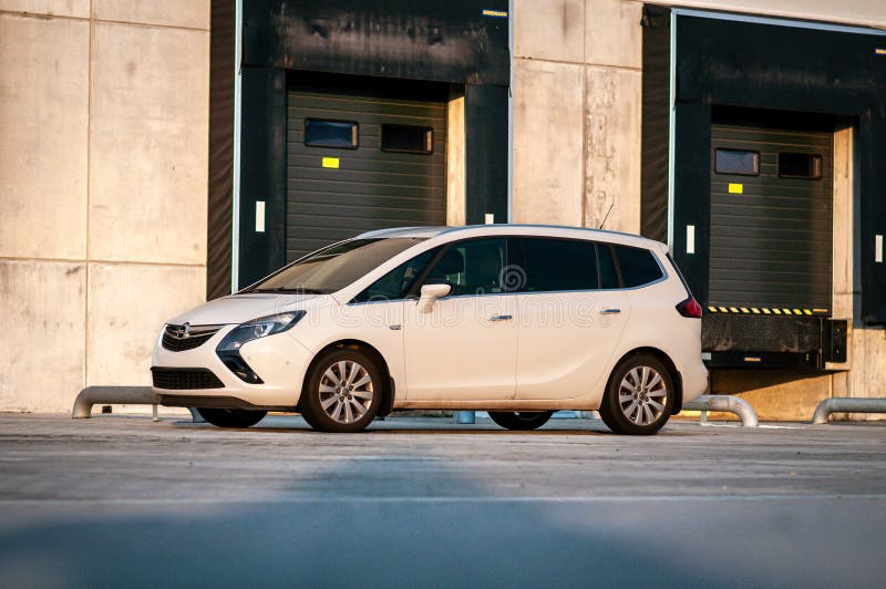 White Family MPV Opel Zafira Tourer, Side View of the Car. Editorial ...