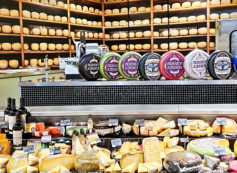 Large Cheese Department with a Variety of Cheeses in a Shopping Center ...