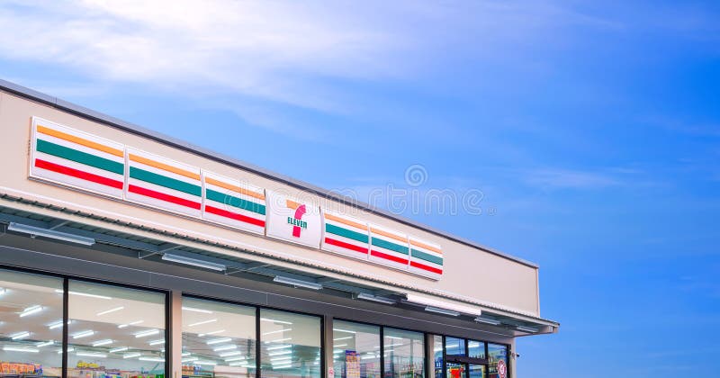 7 Eleven Convenience Building Store with Logo Signboard on Roof Against ...
