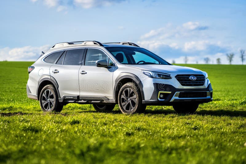 Subaru Outback Outside Off Road in Green Grass Meadow. Editorial Stock ...