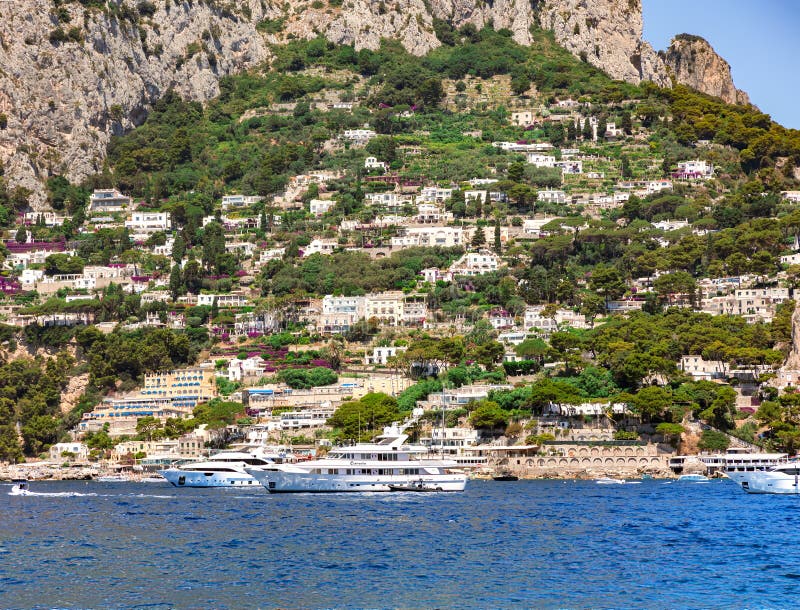 Luxurious View of the Green Island of Capri with Yachts Moored Near the ...