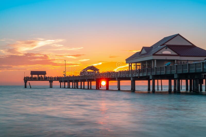 Sunset. Beautiful Seascape with Sunset. Fishing Pier. Summer Vacations ...