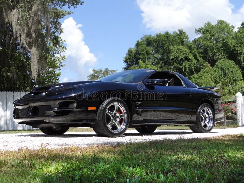 2001 Pontiac Trans am Side View Stock Photo - Image of clouds, american ...