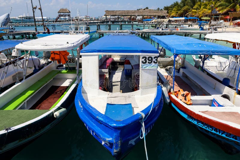 Colorful Tourist Boats at the Shore Line of Isla Mujeres in Mexico ...