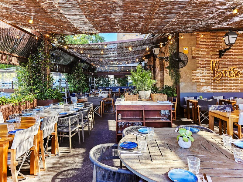 Open Veranda of Brisa Restaurant in a Rustic Style at Port Vell ...