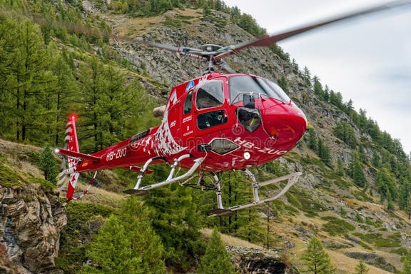 Air Zermatt in Zermatt, Wallis, Switzerland. Helicopter Ecureuil H125 ...
