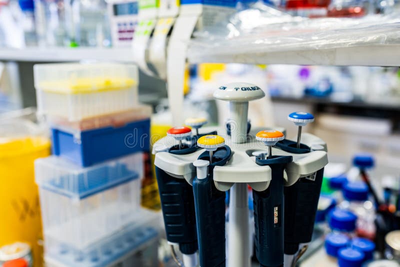 Precision Micropipettes on a Rotating Stand in a Modern Research ...