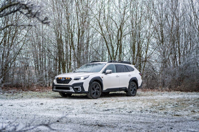 White Subaru Outback SUV in Winter Forest Editorial Stock Image - Image ...