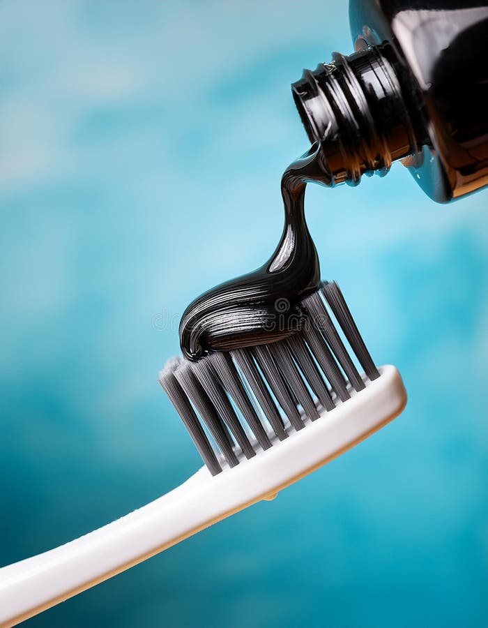 Toothbrush with Black Charcoal Toothpaste. Close Up of Black Toothpaste ...