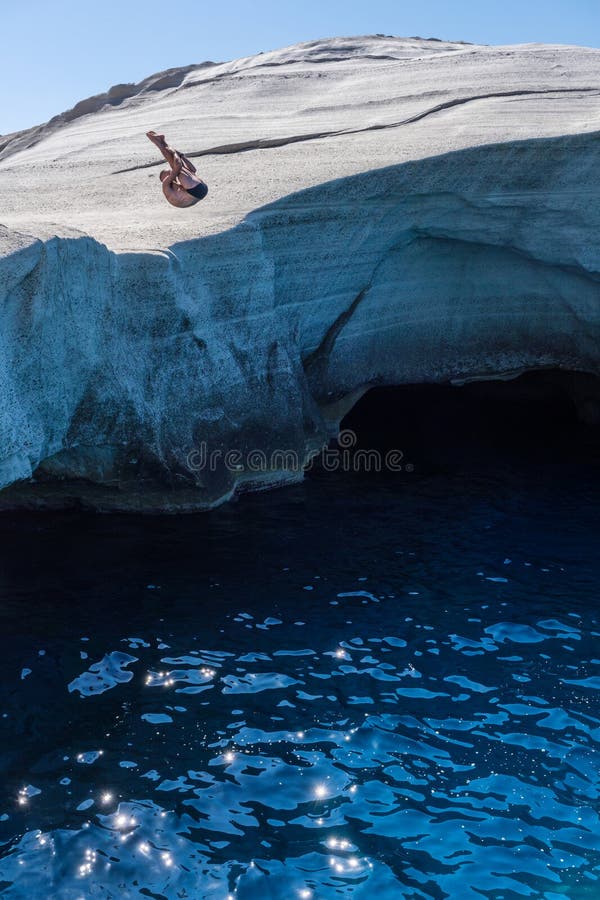 Man Diving at Sarakiniko Beach, Milos, Greece Editorial Image - Image ...
