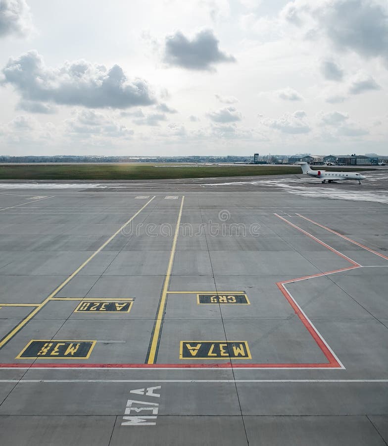 Empty Airport Apron Near Terminal - Parking Lot for Airplanes. Stock ...