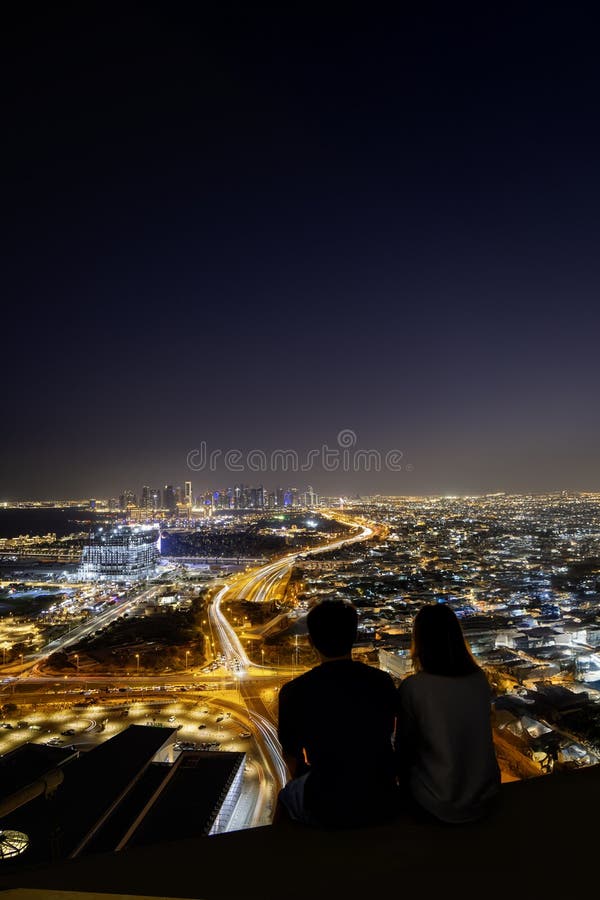 Young Couple Enjoying with Night City View from the Balcony Editorial ...