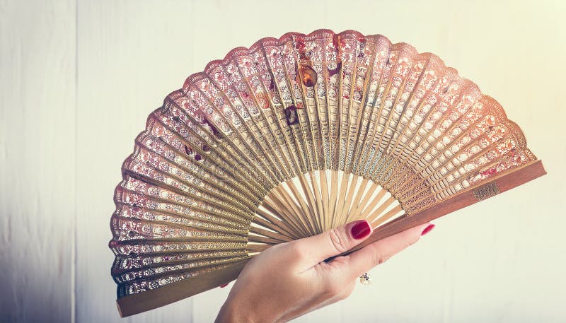 Womans Manicured Hand with Fan Against White Background Stock ...