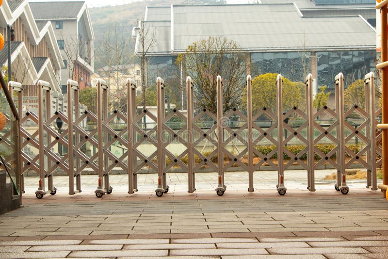 Folding Retractable Fence on Casters. Chrome Barrier on Casters ...